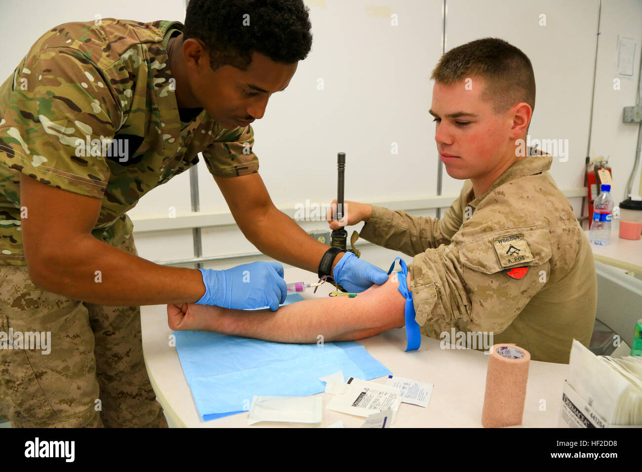 U.S. Navy Hospitalman 3rd Class Wudineh Melketsadek, a field medical ...