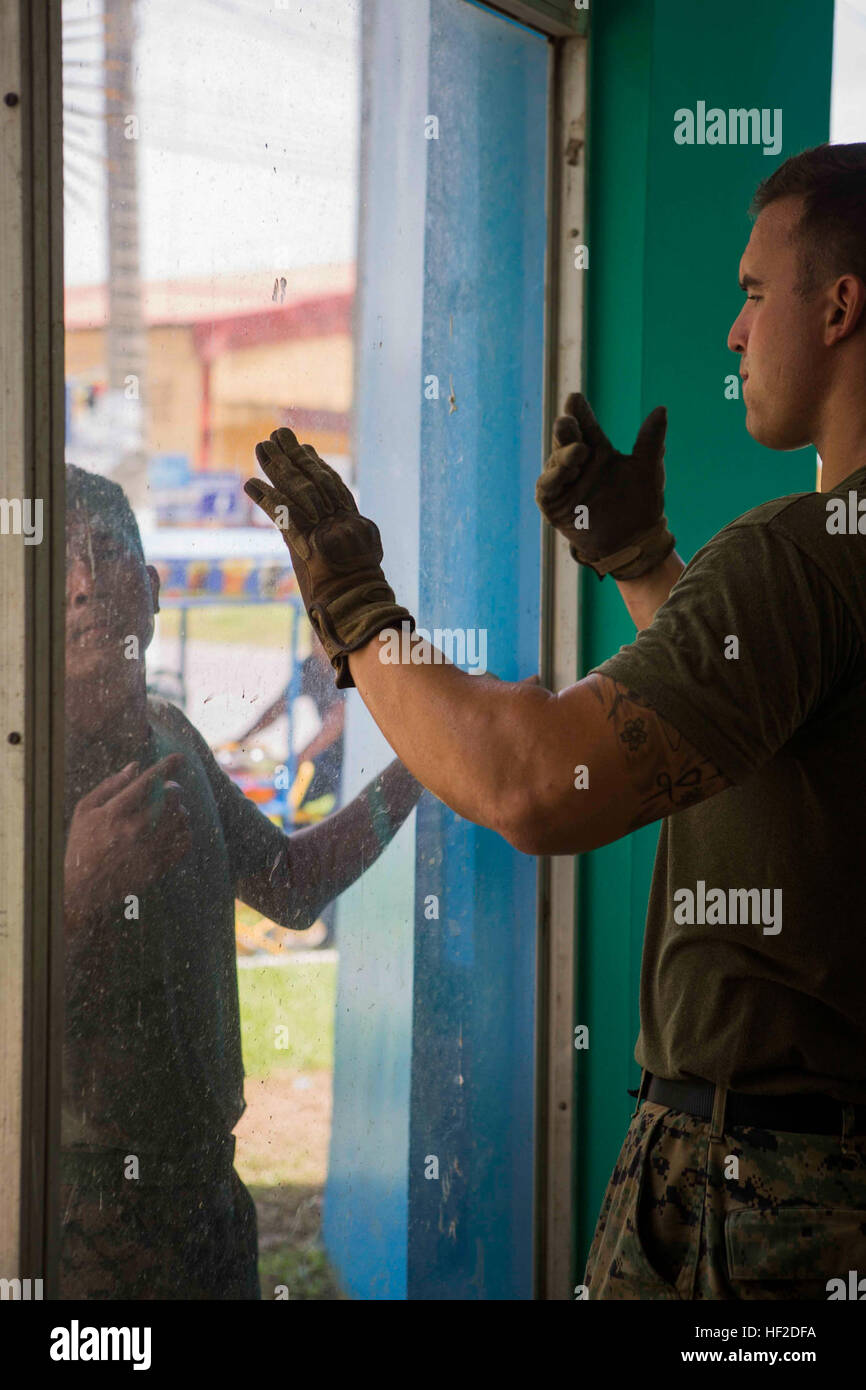 U.S. Marine Corps Sgt. Garrett Burn, a combat engineer, and Lance Cpl ...