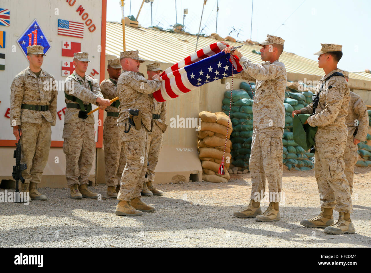 U.S. Marine Col. Peter B. Baumgarten (center right) commanding officer ...