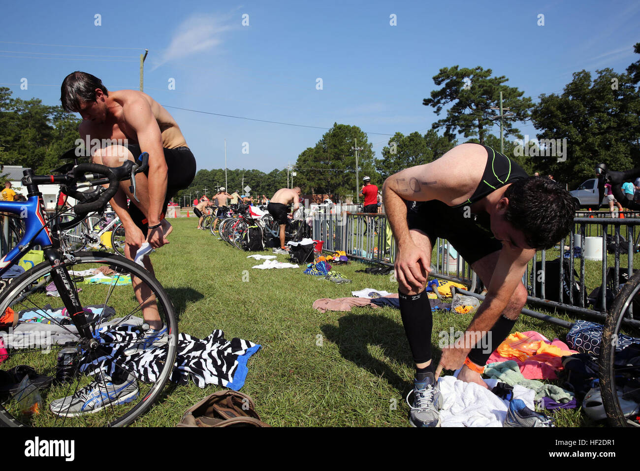 Matt Dougherty, left, and Sam Whitt prepare for a 10-mile bike ride ...