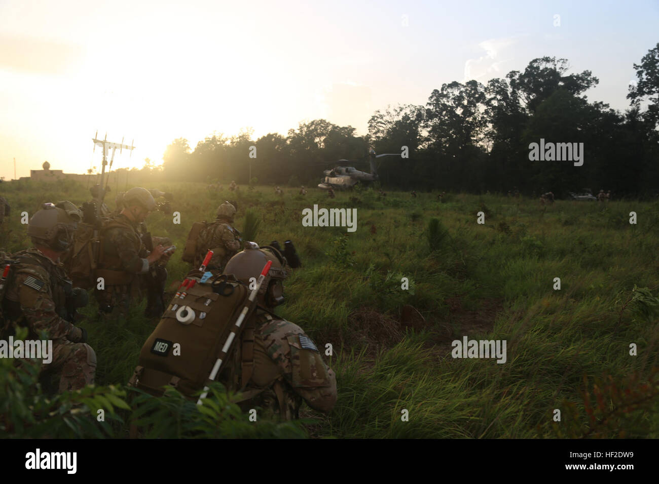 A CH-53 Sea Stallion from Heavy Marine Helicopter squadron 464 inserts ...