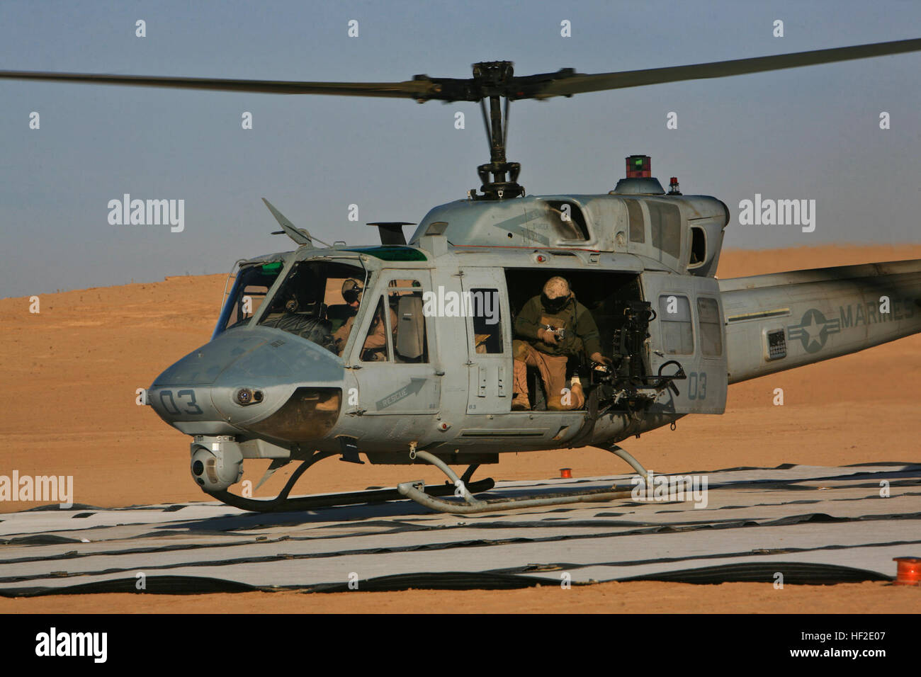 A UH-1 Huey helicopter takes off the at the Jump Command Post so Maj ...