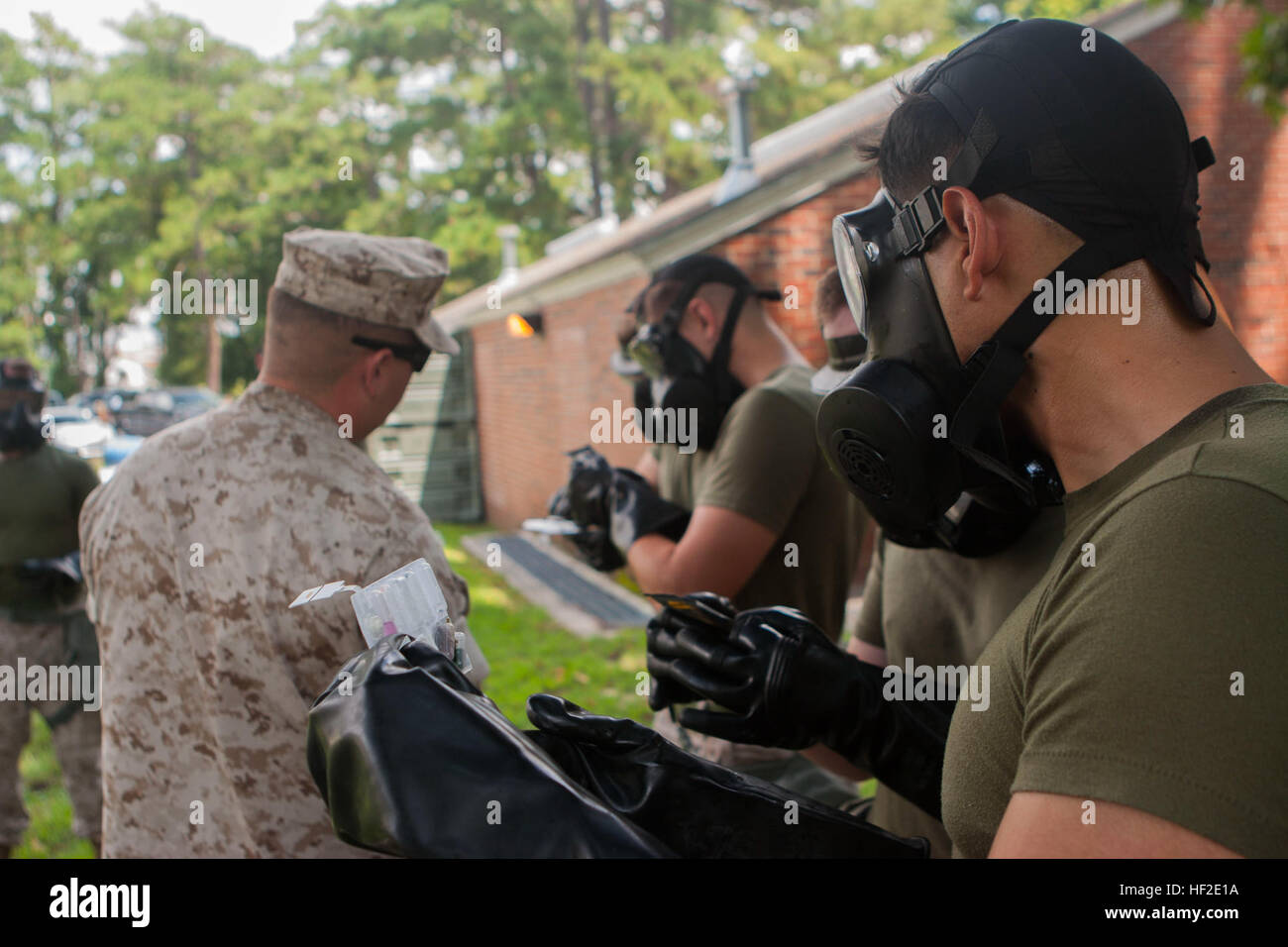 A U.S. Marine with 2d Marine Logistics Group (2D MLG) prepares to crush ...