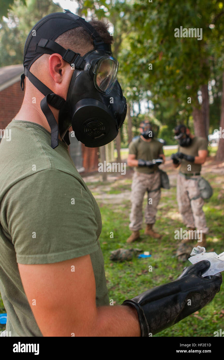 A U.S. Marine with 2d Marine Logistics Group (2D MLG) prepares to crush ...