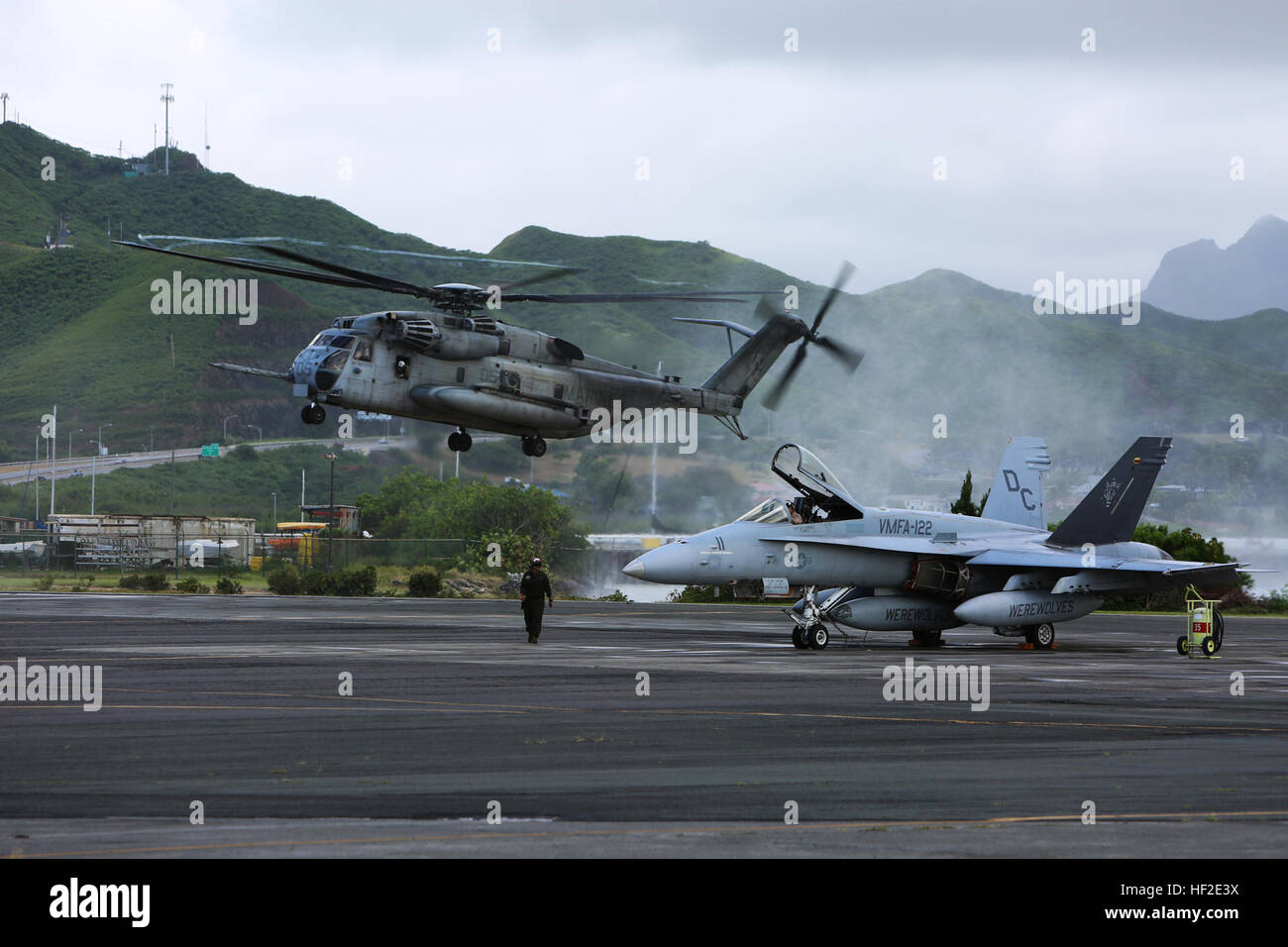 A CH-53D Sea Stallion lands near a Marine Fighter Attack Squadron 122 F ...