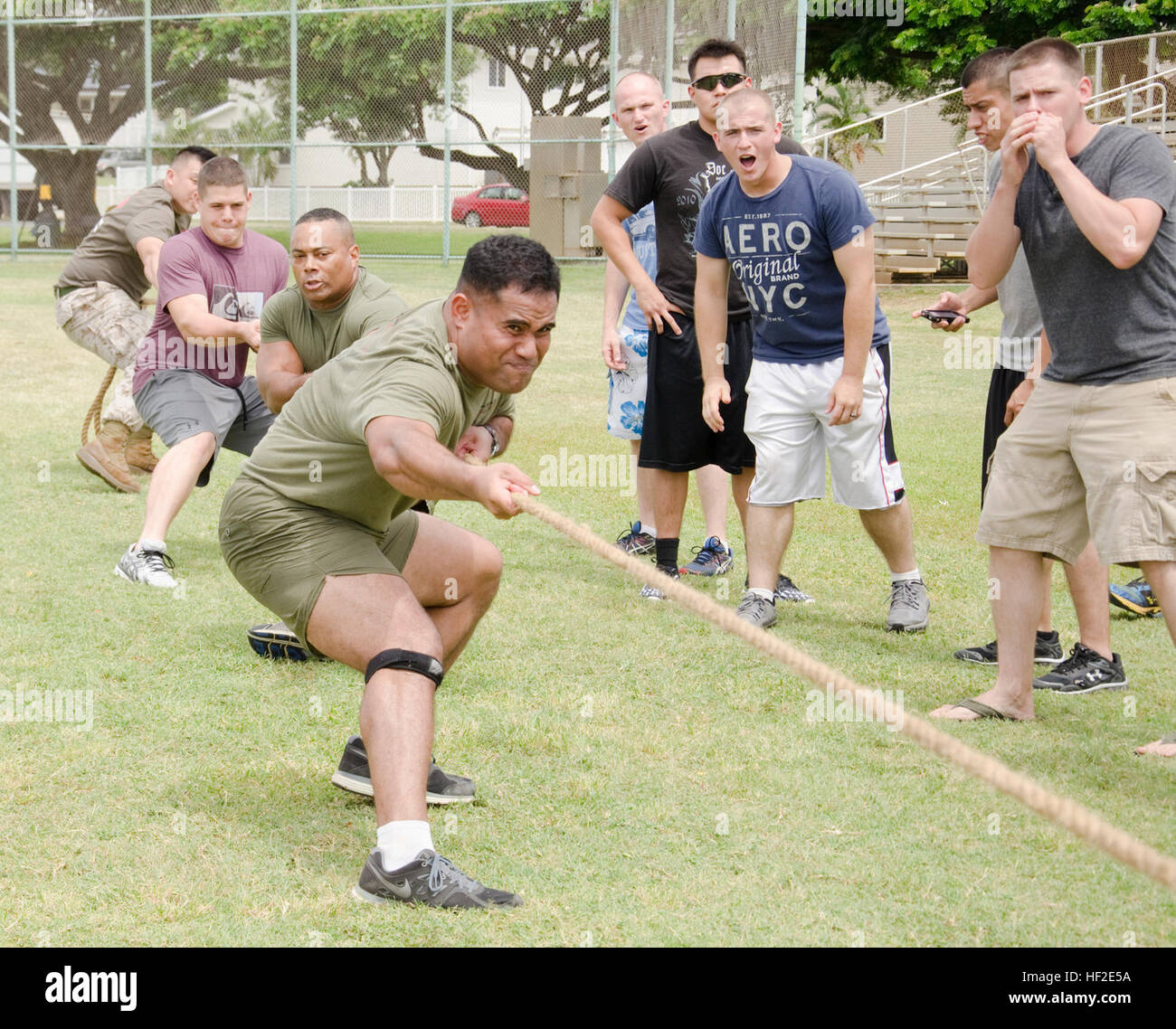 Marines and sailors cheer on their peers in tug of war during the 101 ...