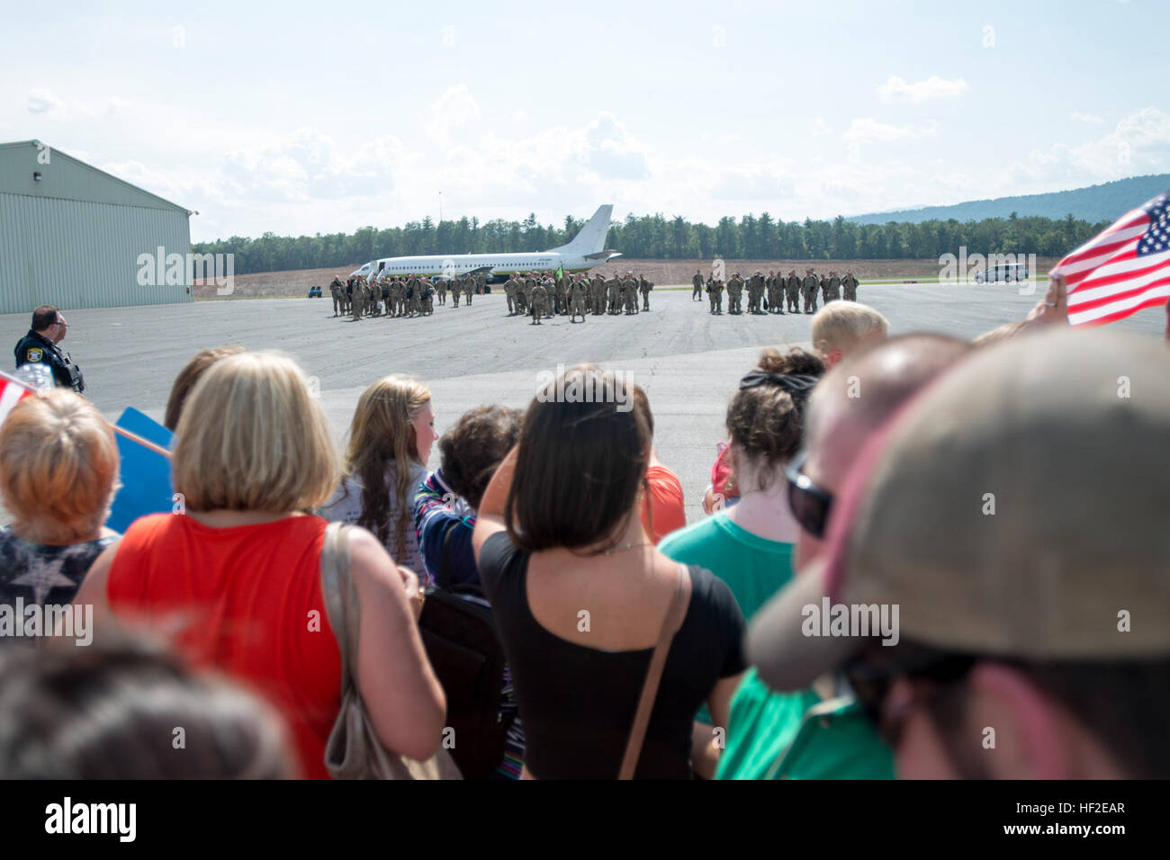 Family and friends wait for their Soldiers of the 211th Military Police ...