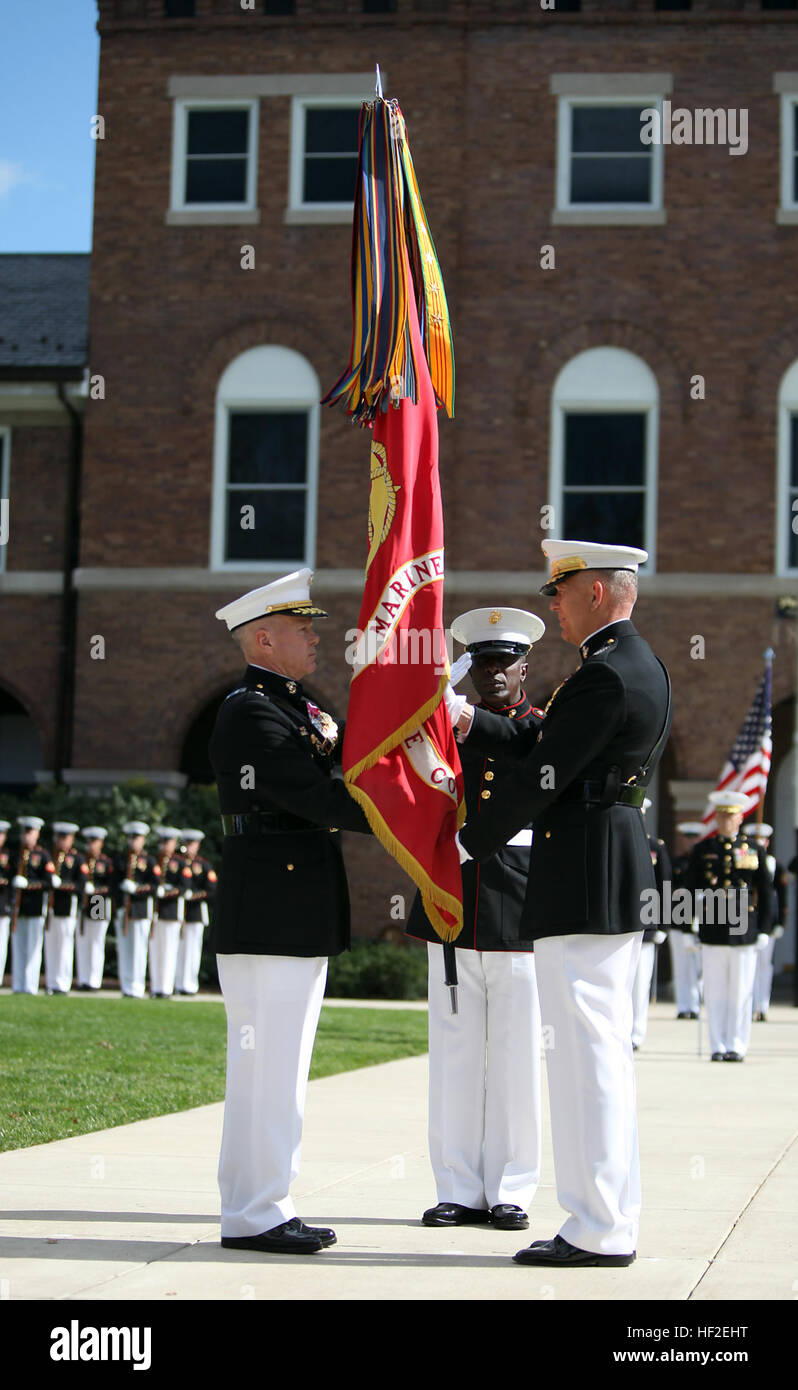 Gen. James Amos recieves the Marine Corps Colors from Gen. James T ...