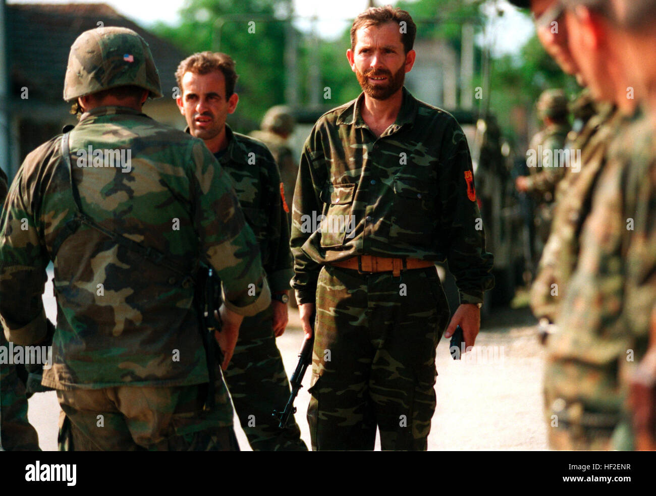 990630-M-5696S-002 Members of the Kosovo Liberation Army stand in ...