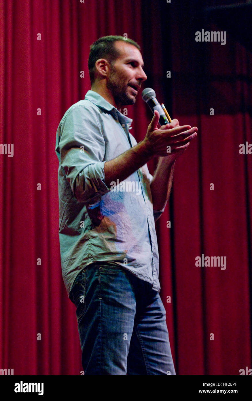 Comedian Patrick Tyrrell performs stand-up comedy during the Comedy for ...