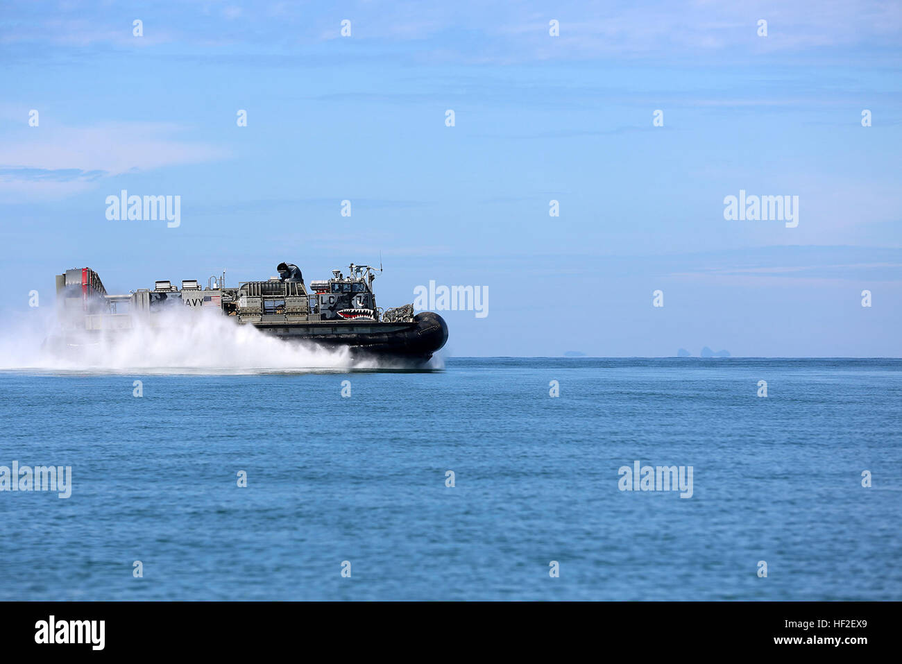 A landing craft, air cushion (LCAC) approaches a Malaysian beach during ...