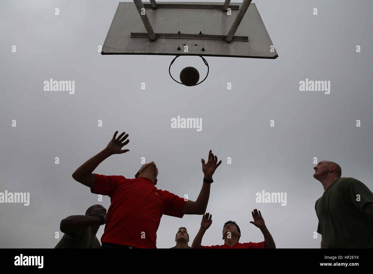 U.S. Marines and Sailors play basketball with Peruvian Marines during a ...