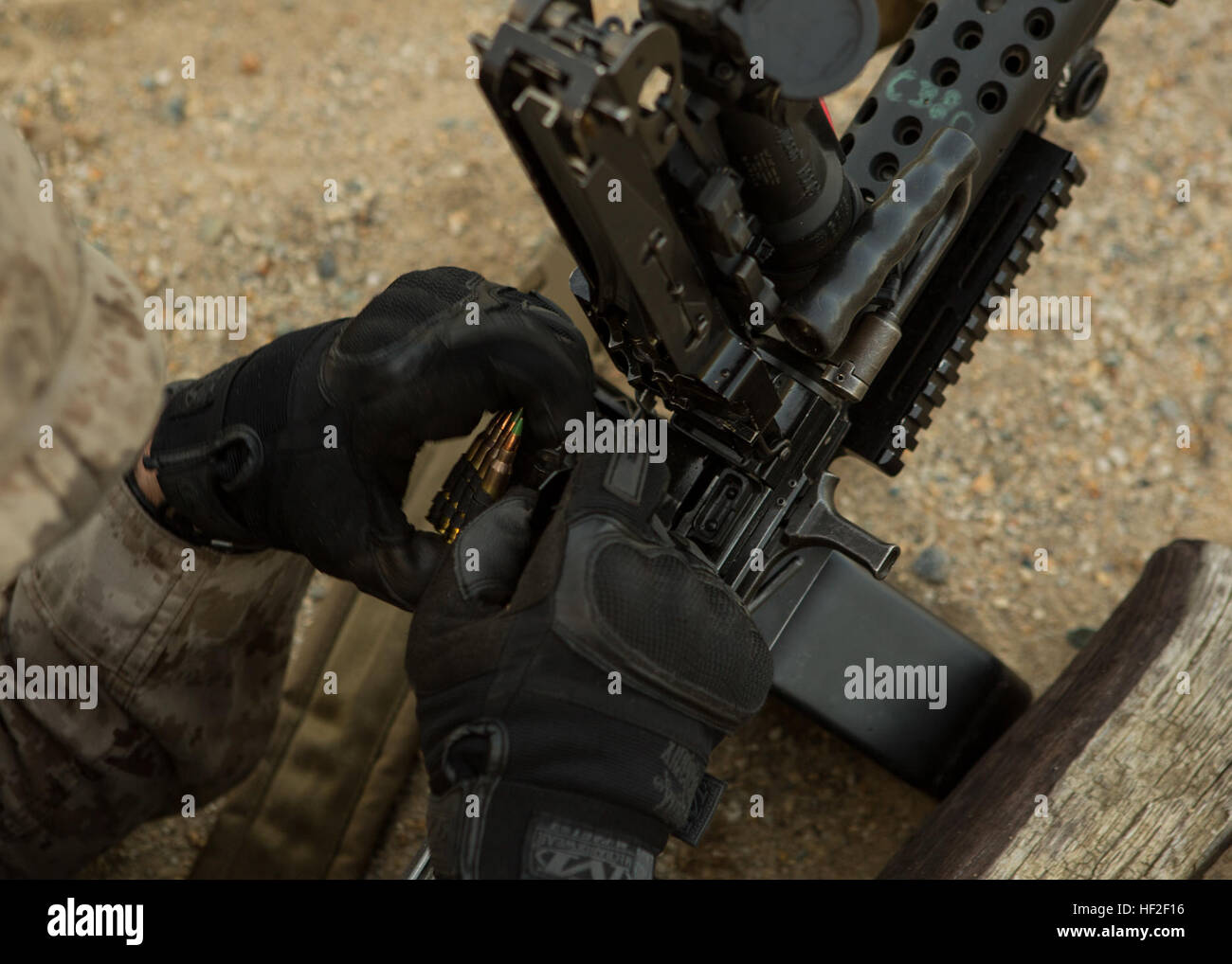Lance Cpl. Walter Lindner, an assault amphibious vehicle crewman, fires ...