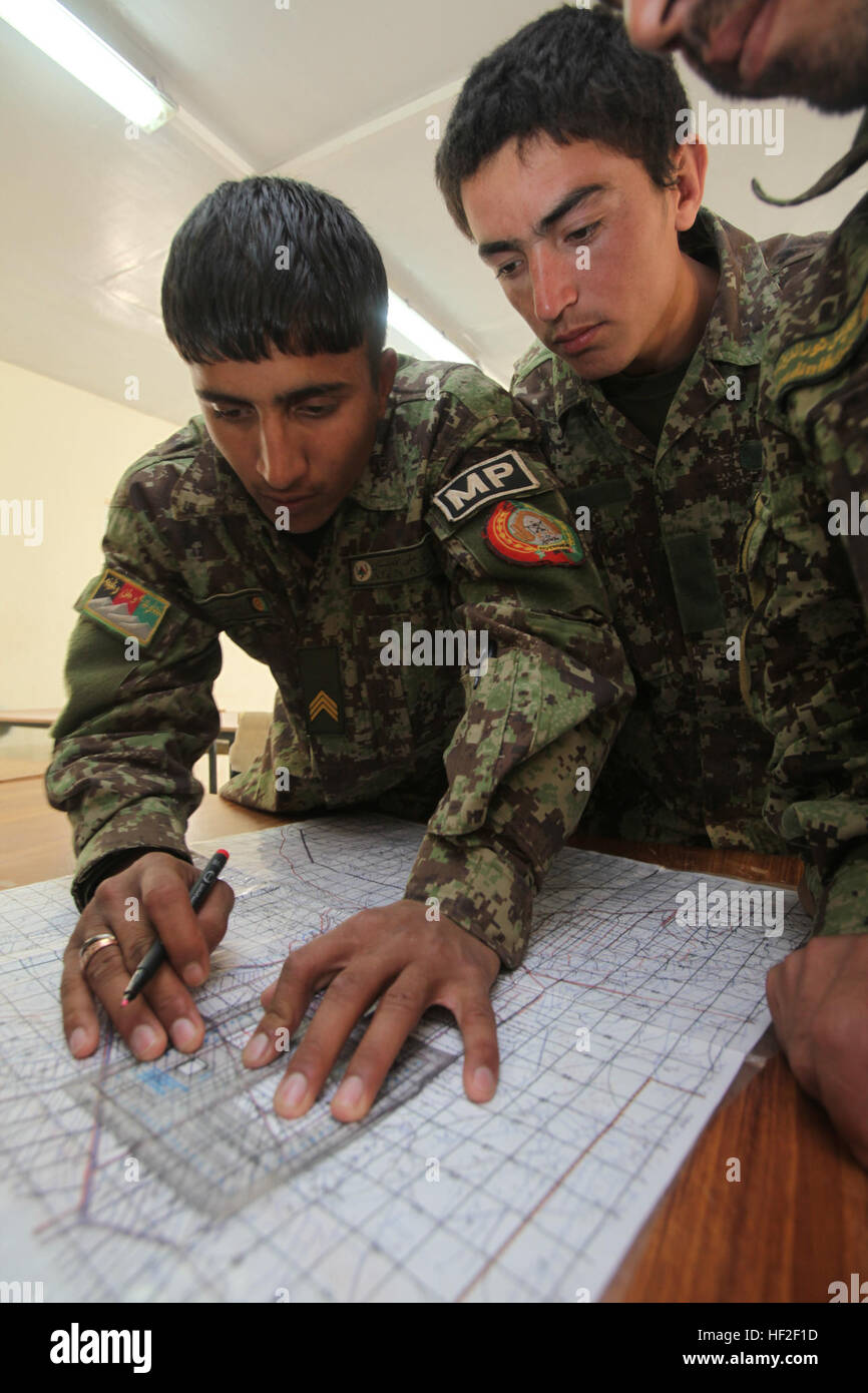 (From left to right) Afghan National Army Staff Sgts. Sahebullah and ...
