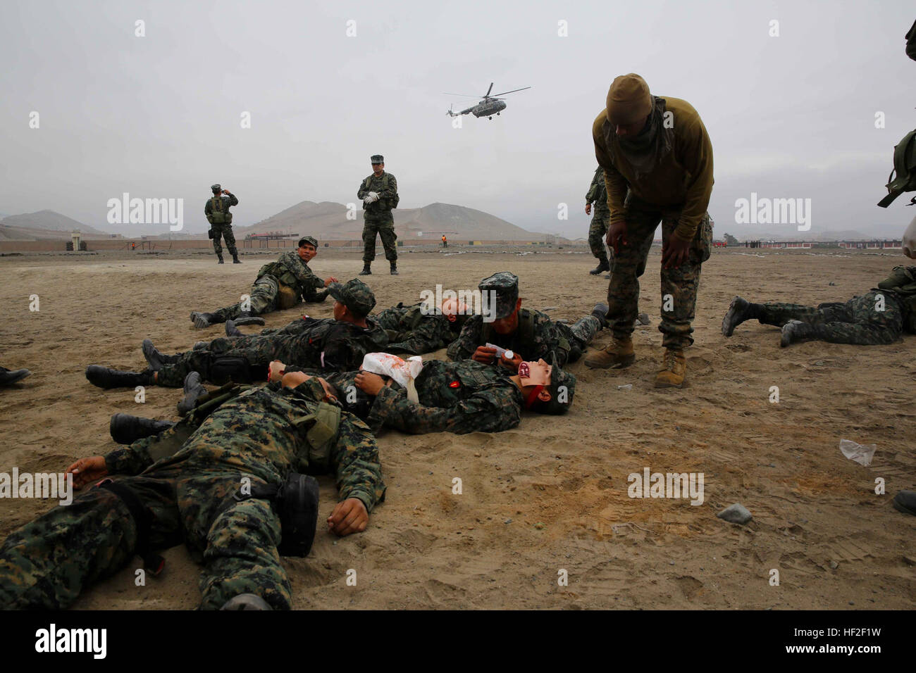 Petty Officer 2nd Class Brad Olton, right, a Navy hospital corpsman ...