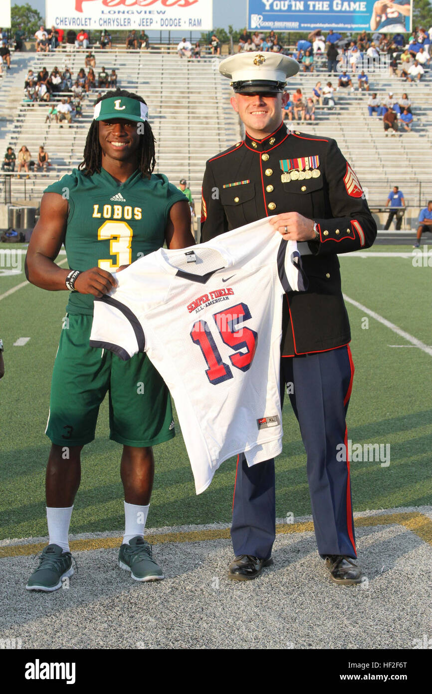 Sgt. Cody L. Hill, a recruiter with Recruiting Station Dallas, presents ...