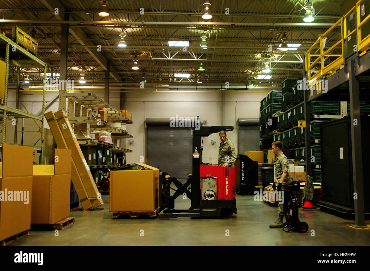 U.S. Air Force Tech. Sgt. James Guinn (center) and Airman 1st Class ...