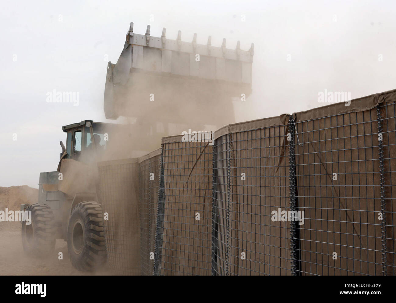 A military front-end loader, operated by Combat Logistics Battalion 3 ...