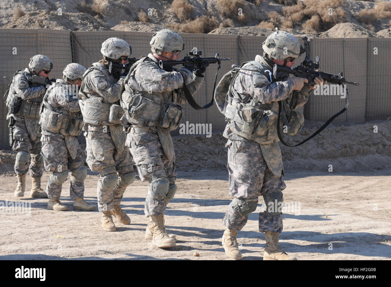 U.S. Soldiers, from 40th Engineer Battalion, 2nd Brigade Combat Team, 1st Armored Division ...