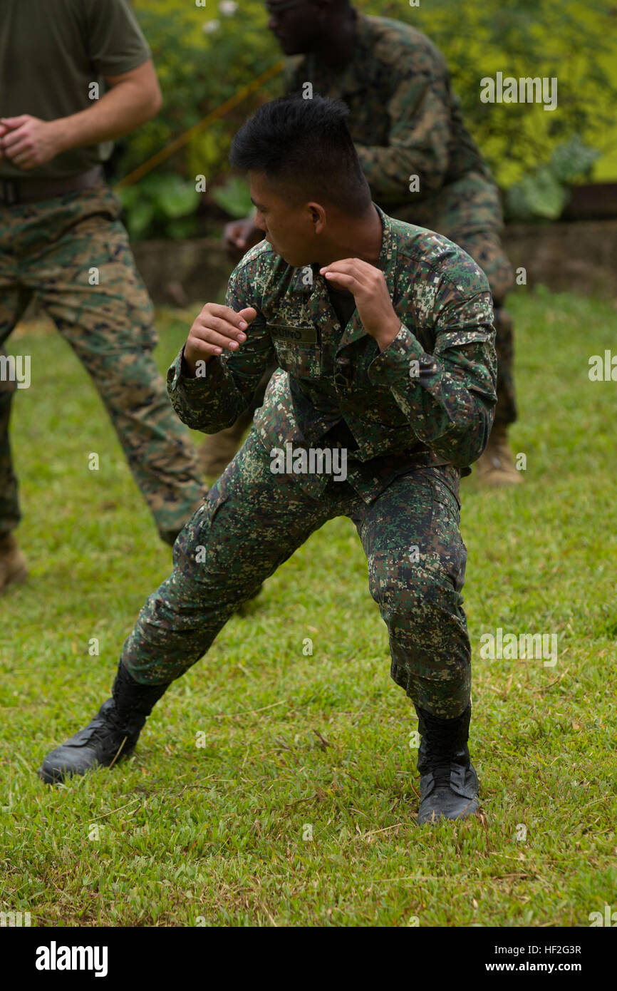 Philippine Marine Cpl. Eugene Aquino, communication radioman with 34th ...