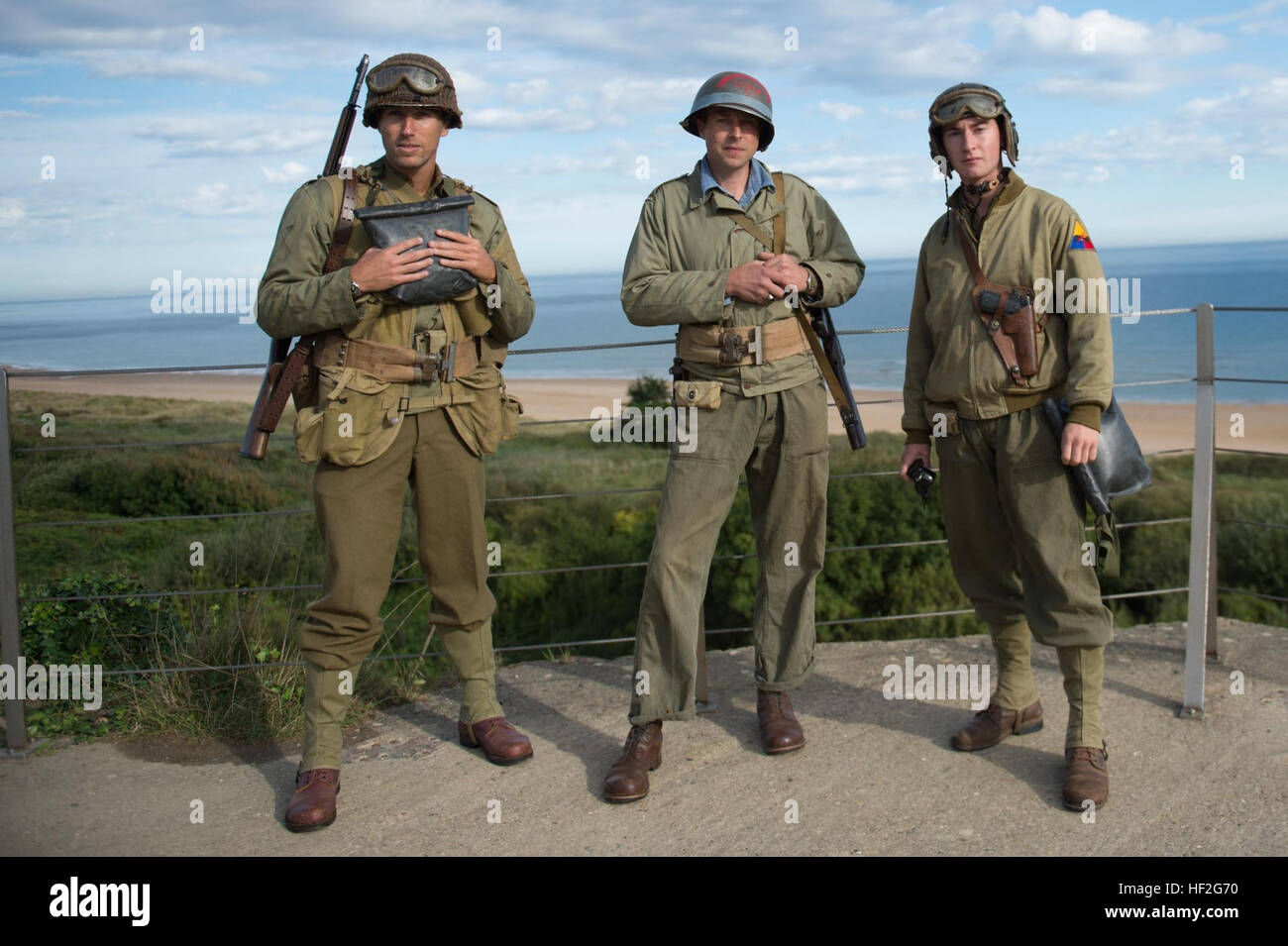 French soldiers wearing U.S. Army World War II-era uniforms pose for a ...