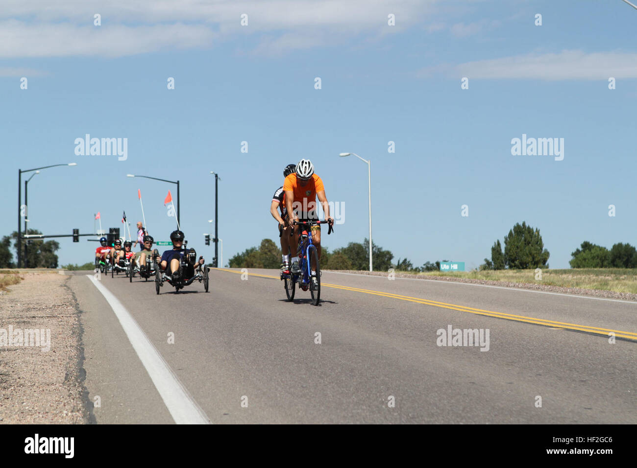The Marine cycling team rides aborad Fort Carson during the team's ...