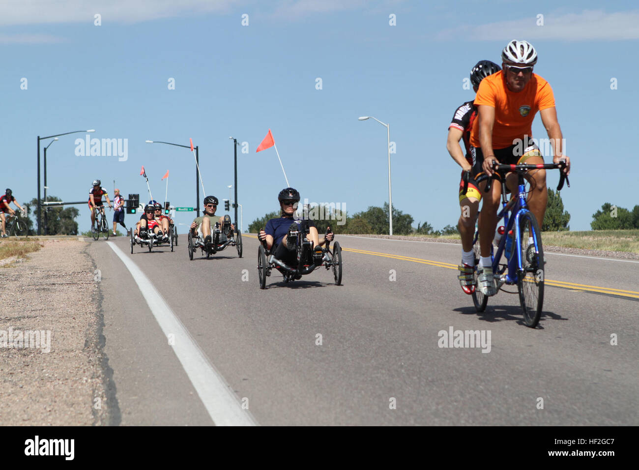 The Marine cycling team rides aborad Fort Carson during the team's ...