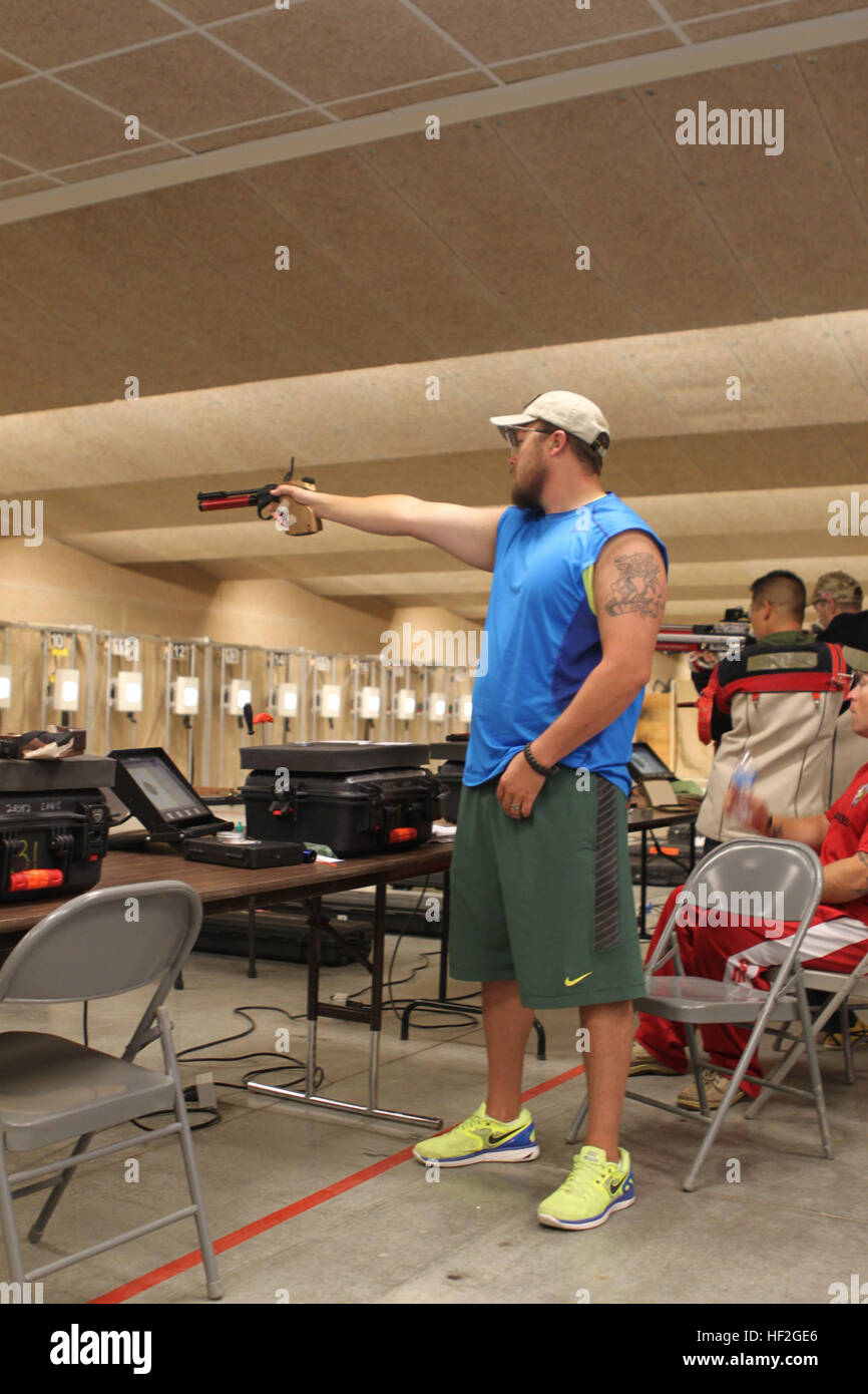 Sgt. Clayton McDaniel, a native of Molalla, Oregon, takes aim with his ...