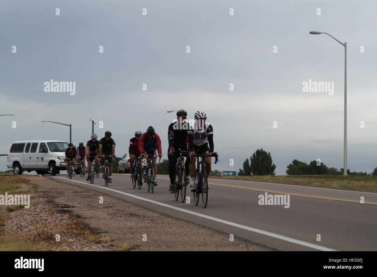 Members of the Marine team head down the road during cycling practice ...