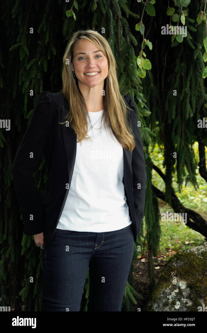 Amy Conroy, the new Family Programs Director for the 142nd Fighter Wing stands for a photograph ...