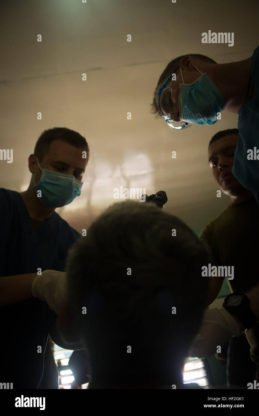U.S. Navy Corpsmen with 3rd Medical Battalion remove teeth from a local ...