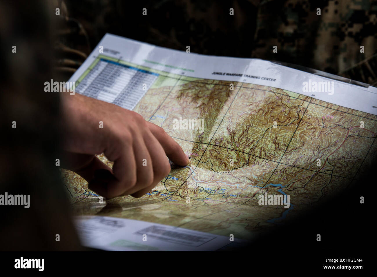 Marines participating in a Corporals Course locate points on a map Sept ...