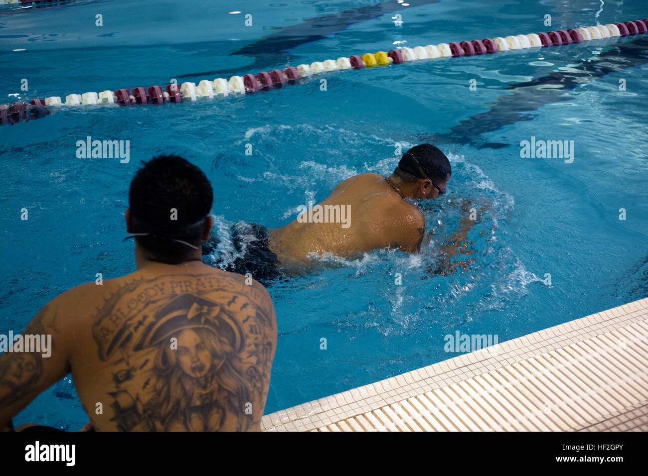 Corporal Alex Nguyen, 26, a native of Fremont, Nebraska, watches Cpl ...
