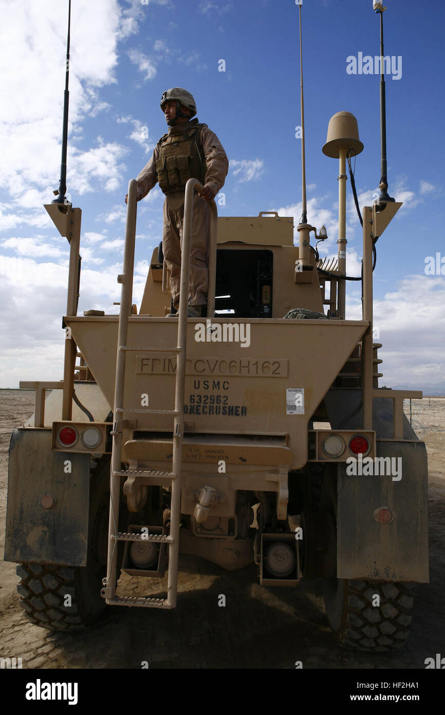 Sgt. John W. Springs stands atop a Buffalo Mine Protected Clearance ...