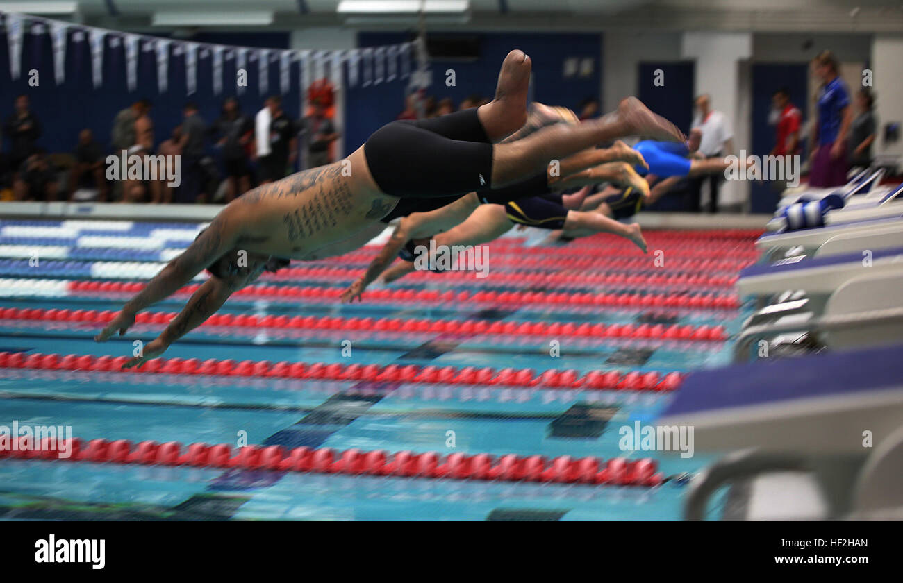 Sgt. Alex Nguyen from Fremont, Nebraska, takes off for the 50-meter ...