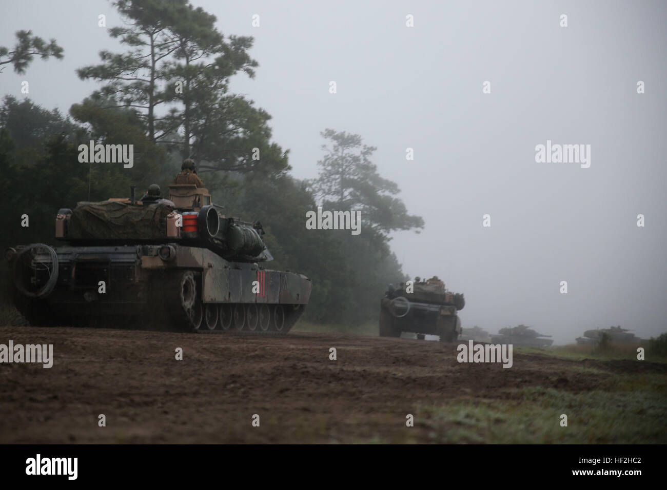 Tanks from Alpha Co., 2nd Tank Battalion, 2nd Marine Division line up ...