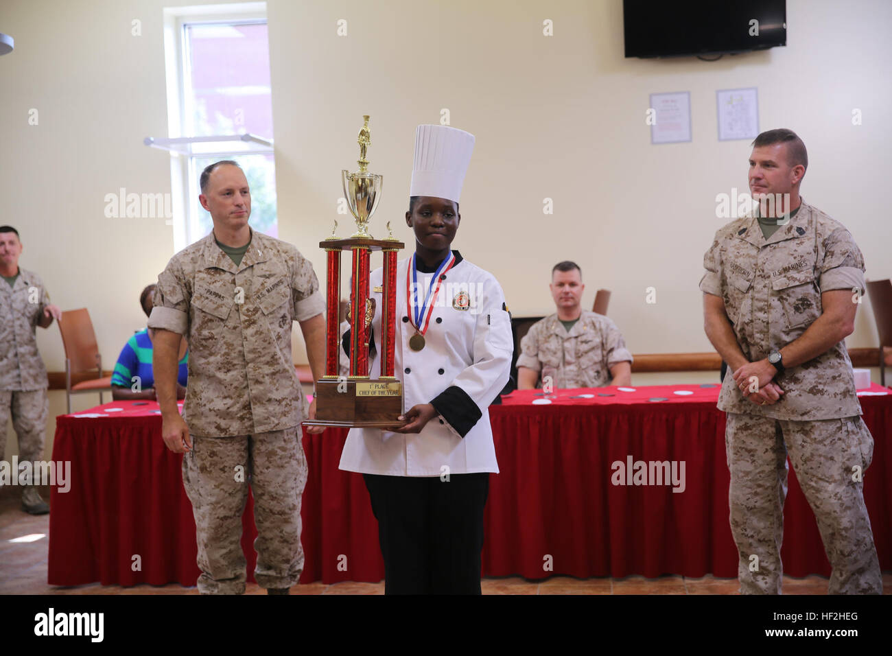 Lance Cpl. Bianca Sanders smiles as she holds her first place trophy ...