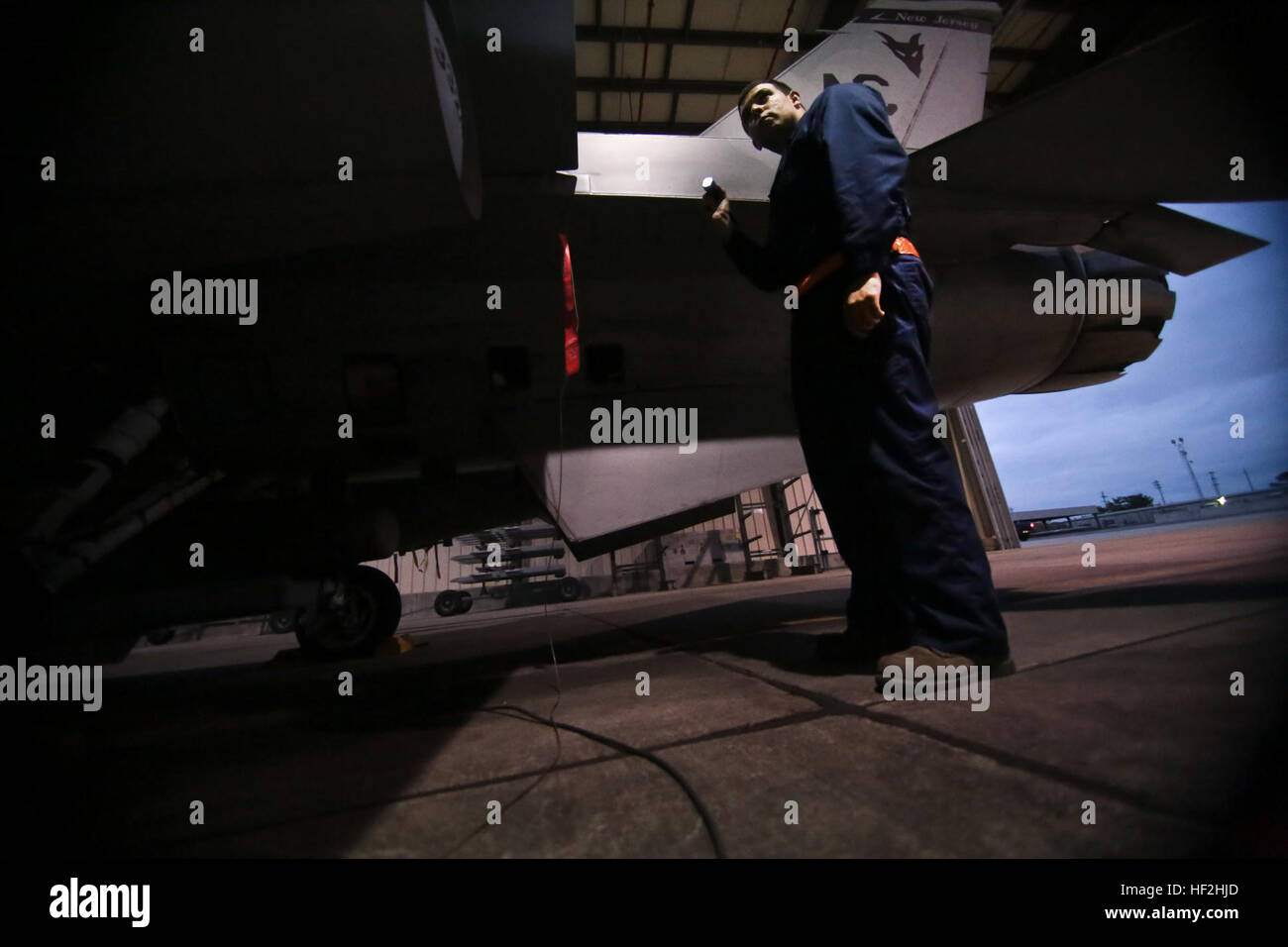 U.S. Air Force Staff Sgt. Anthony Torres does a pre-flight walk around ...
