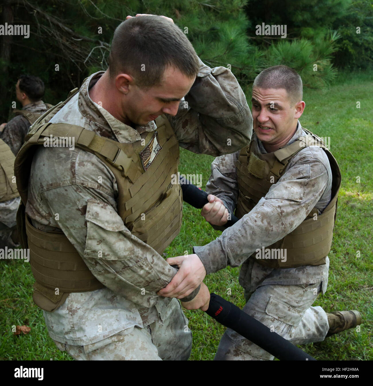 Cpl. Gregory Buckley, right, a Marine with 8th Communication Battalion ...