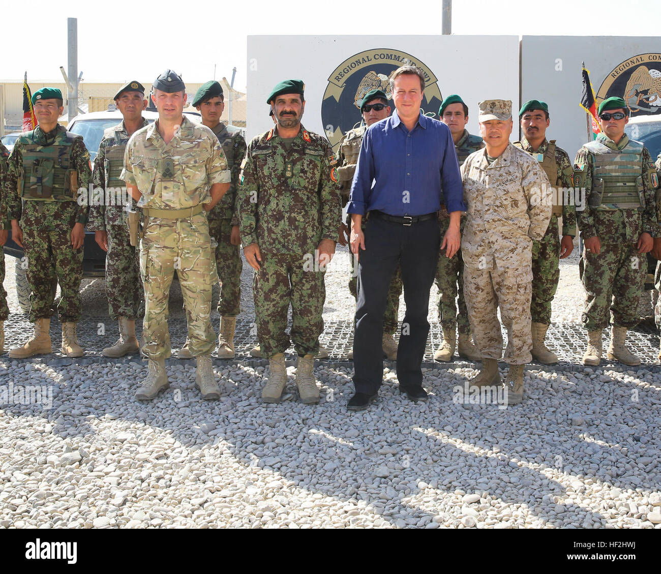 U.K. Prime Minister David Cameron, third from left, stands with, Brig ...