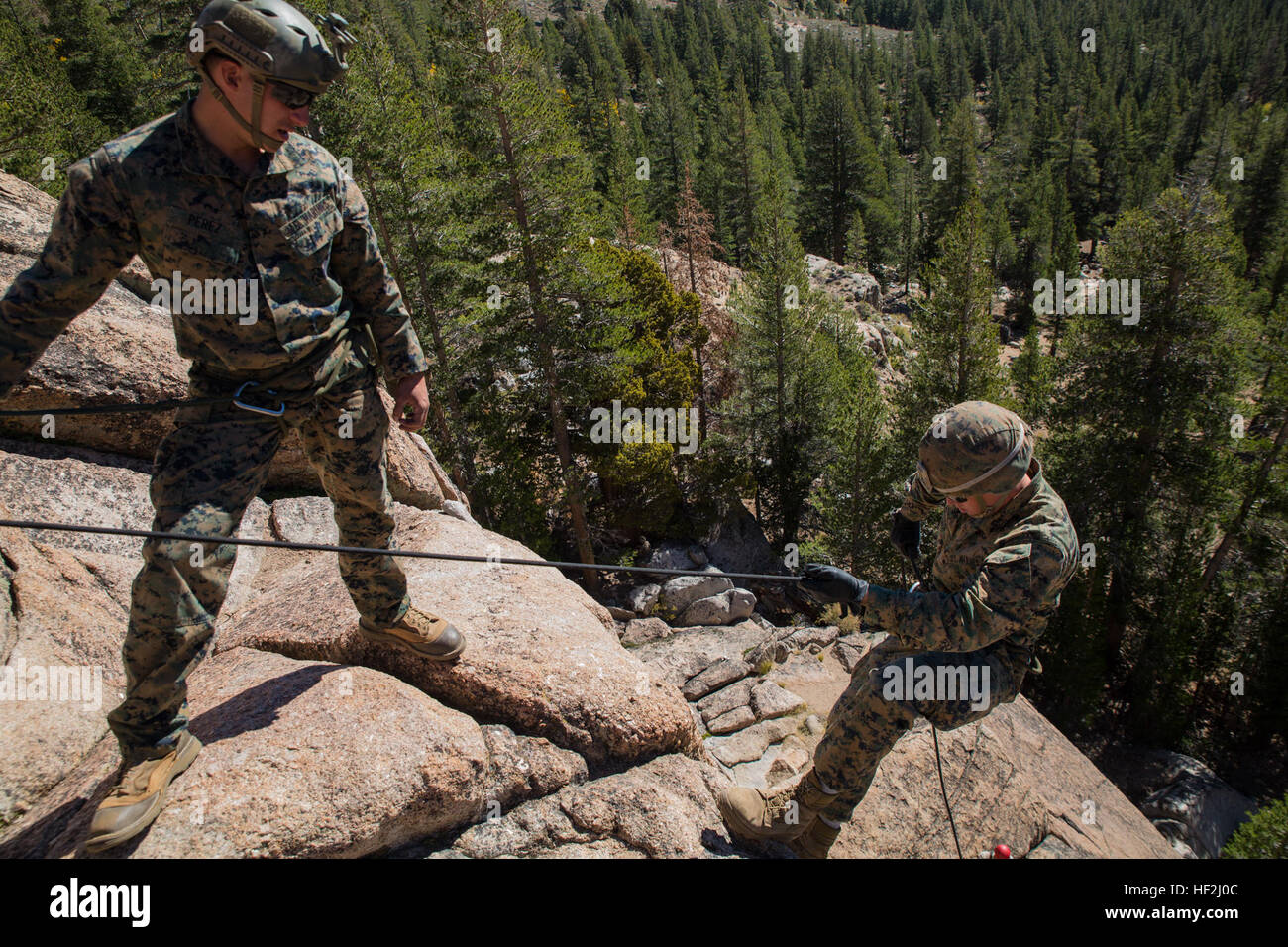 Corporal Spencer Perez (left), a scout sniper with Weapons Company, 2nd ...