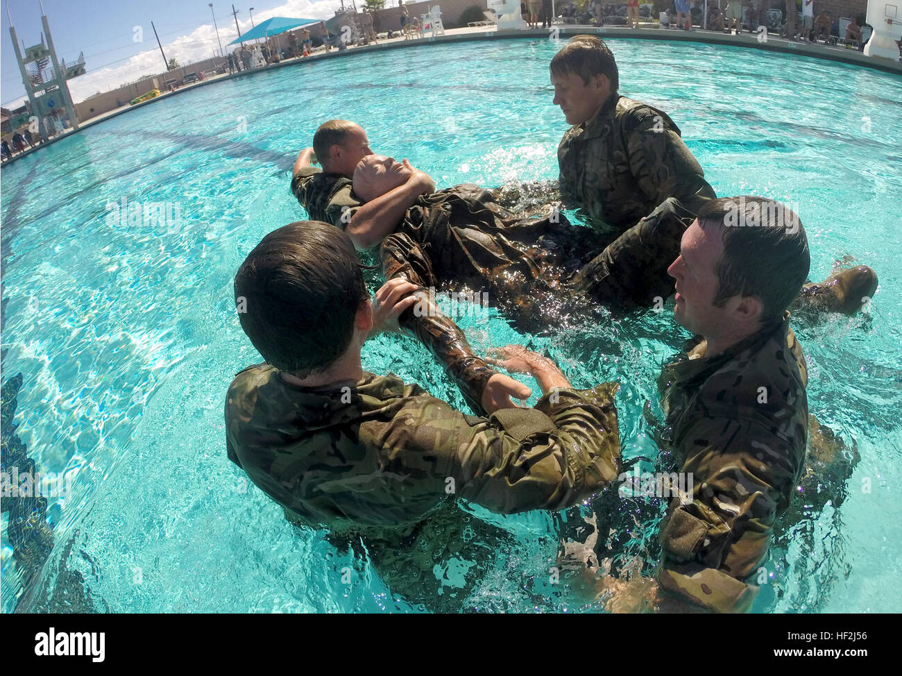 Members of the British Royal Marines maneuver through an amphibious ...