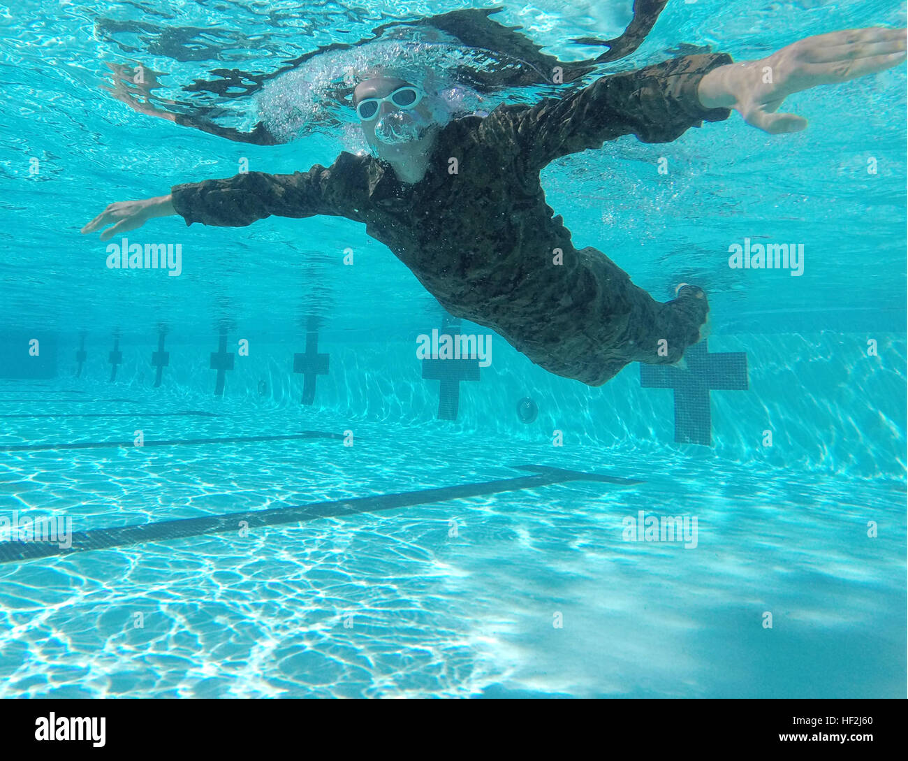 A U.S. Marine with Marine Corps Air Ground Combat Center (MCAGCC) swims ...