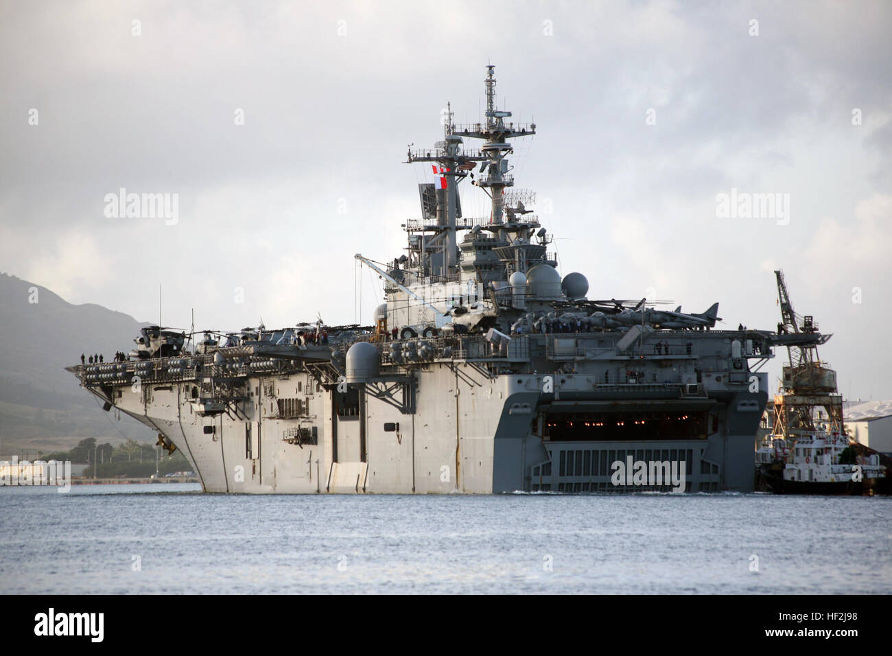 The amphibious assault ship USS Boxer pulls pier side during a port ...