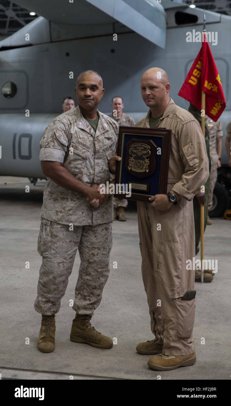 Col. Brian Cavanaugh, left, presents the Chief of Naval Operations ...