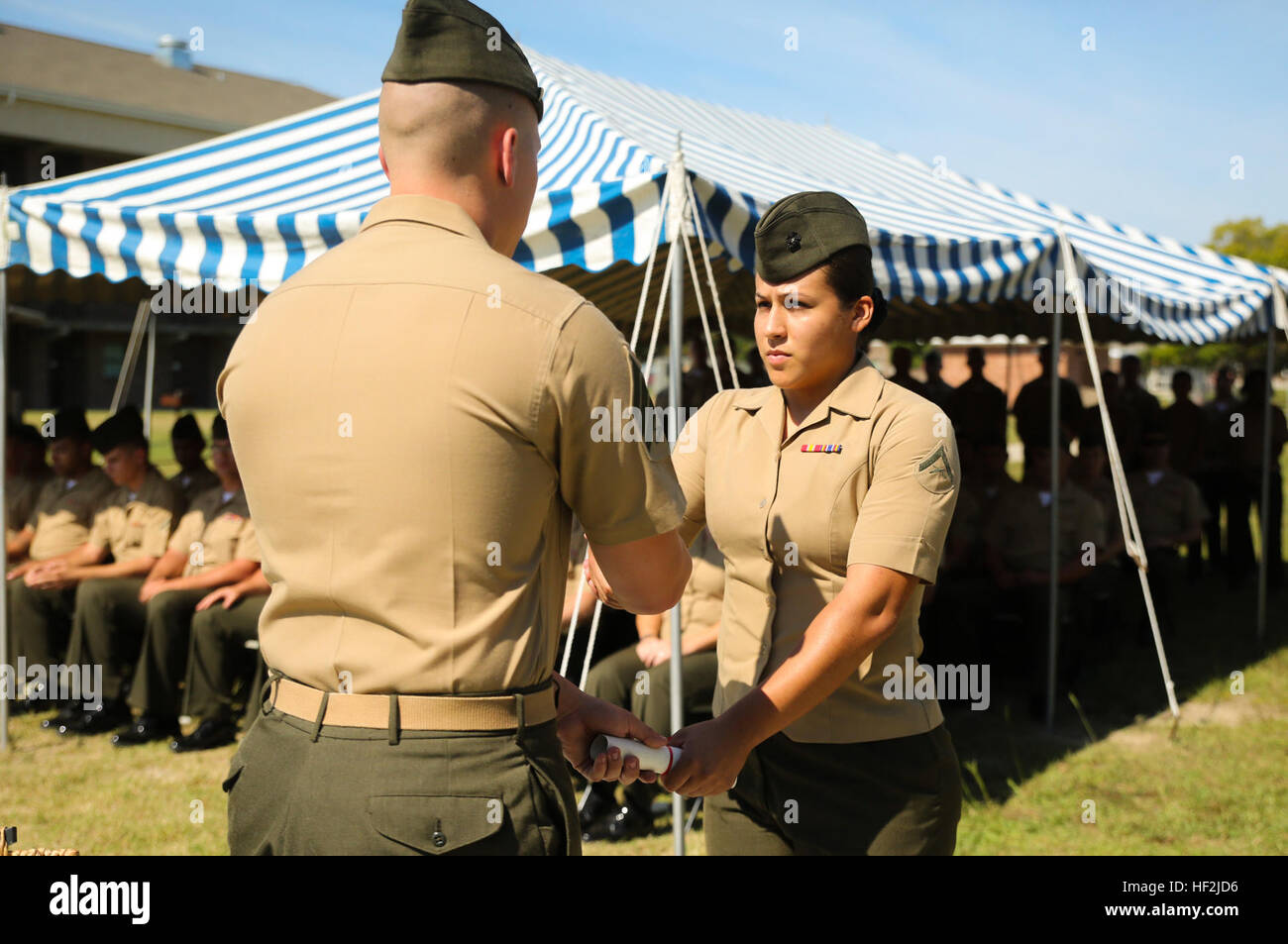 A lance corporal with 8th Engineer Support Battalion receives her ...