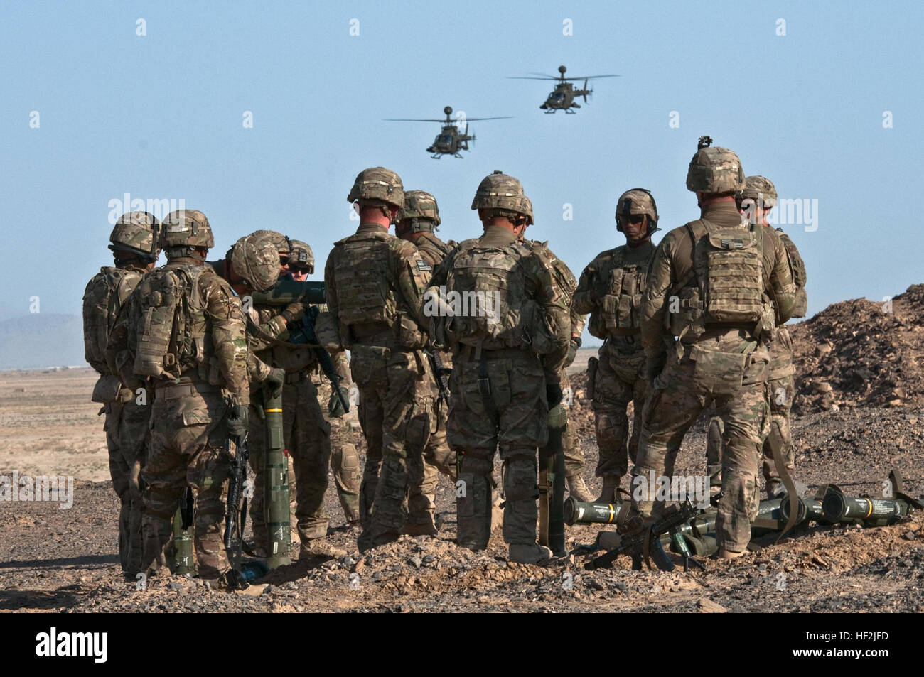 Kiowa helicopters circle the area as Soldiers serving with the 4th ...