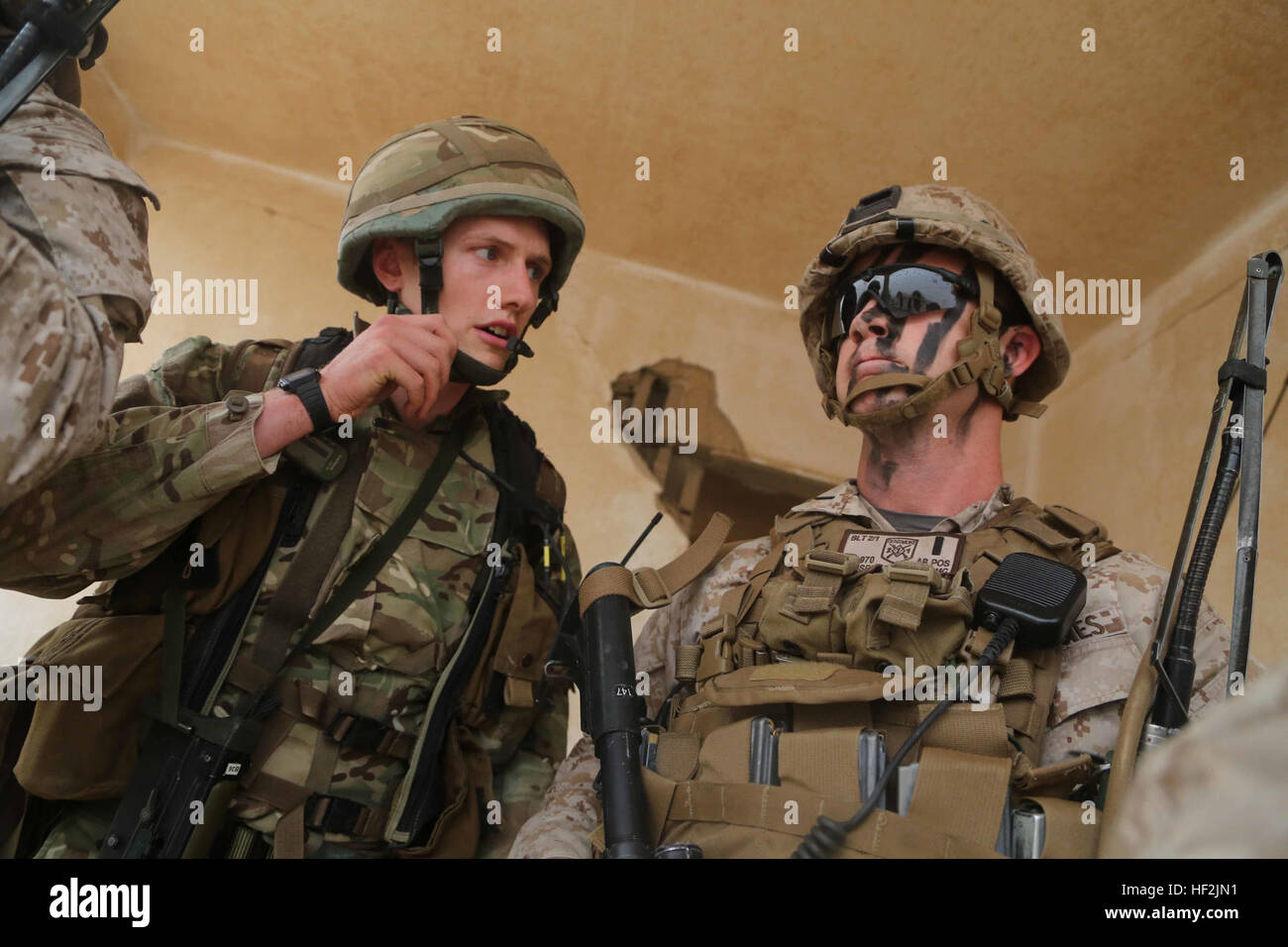 First Lt. Jake Lunsford, right, a platoon commander with Fox Company ...