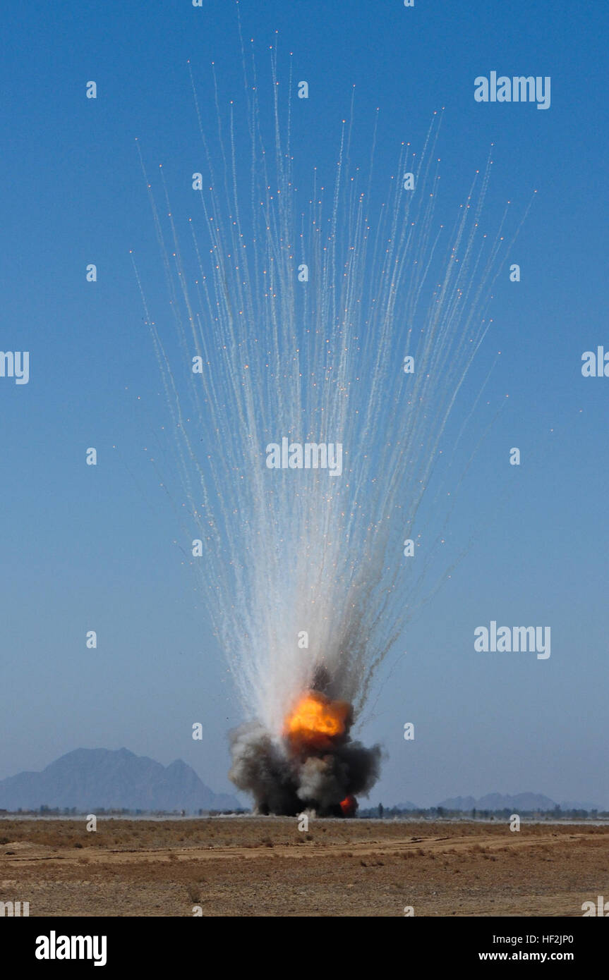 A controlled explosion sends smoke and flames into the southern ...