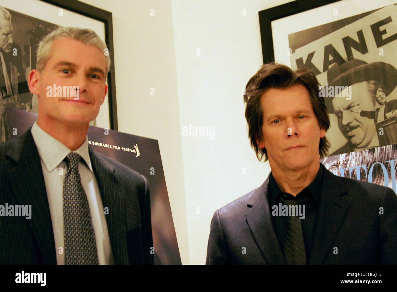 Retired Lt. Col. Michael R. Strobl stands next to actor Kevin Bacon ...